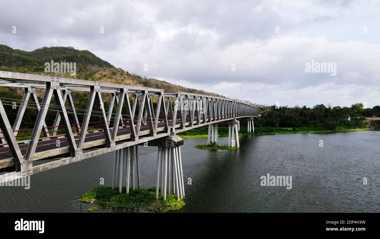 Aerial of long steel bridge in Kretek village, Yogyakarta, Indonesia ...