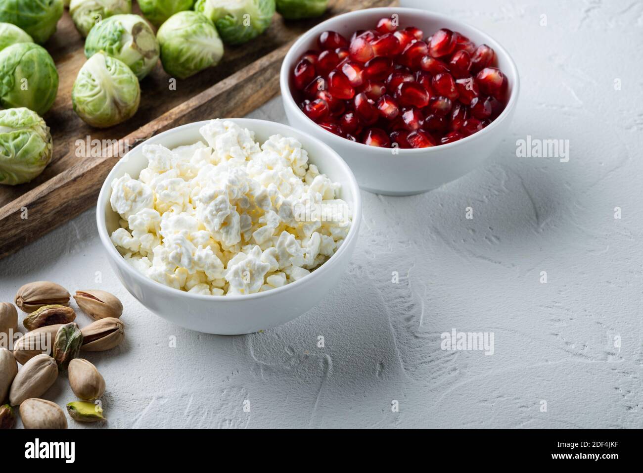 Cottage cheese, curd, on white textured background Stock Photo - Alamy