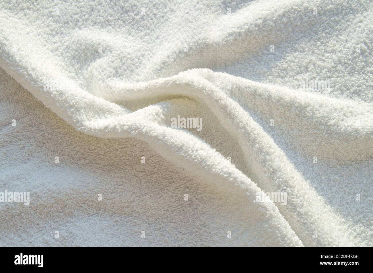 White Terry bath towel, texture with pleats, background Stock Photo - Alamy