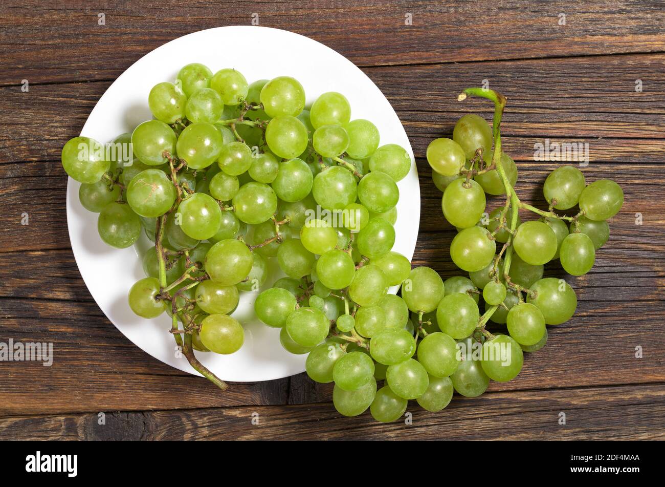 Grapes in plate hi-res stock photography and images - Alamy
