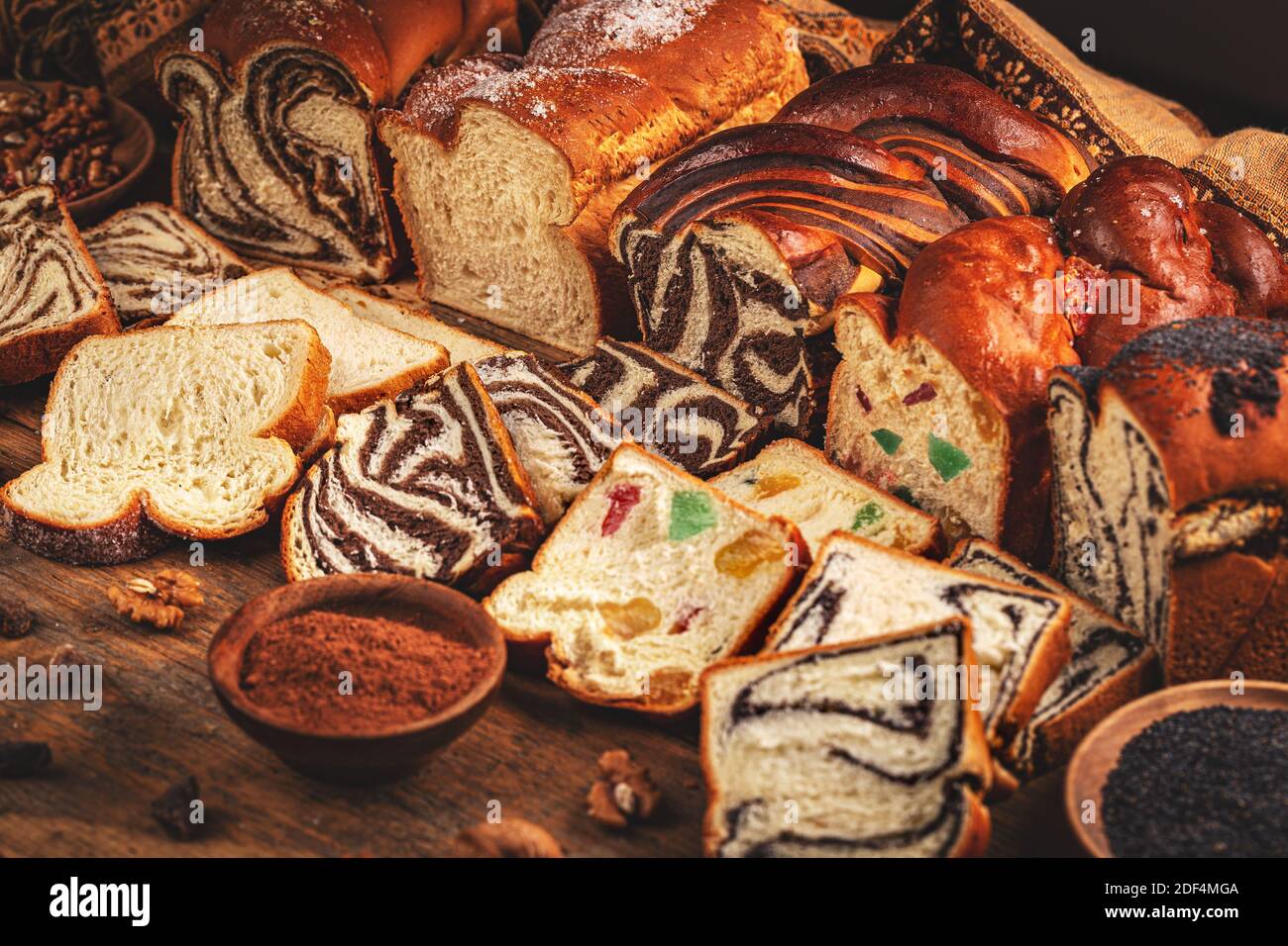 Assortment of soft and fluffy sweet white bread with different stuff ...