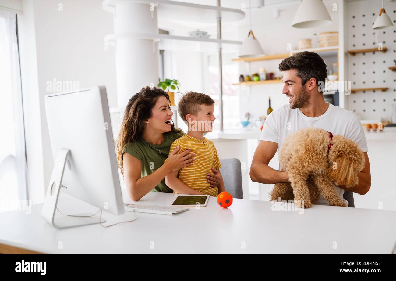 Parents helping to children studying online at home. Lockdown and ...