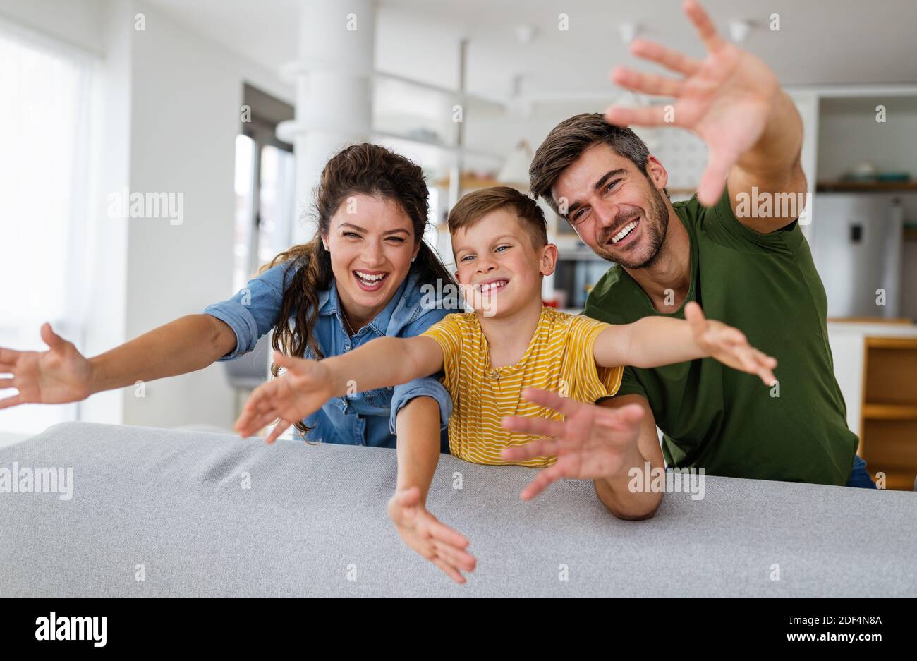 Happy family spending time together, having fun at home Stock Photo - Alamy