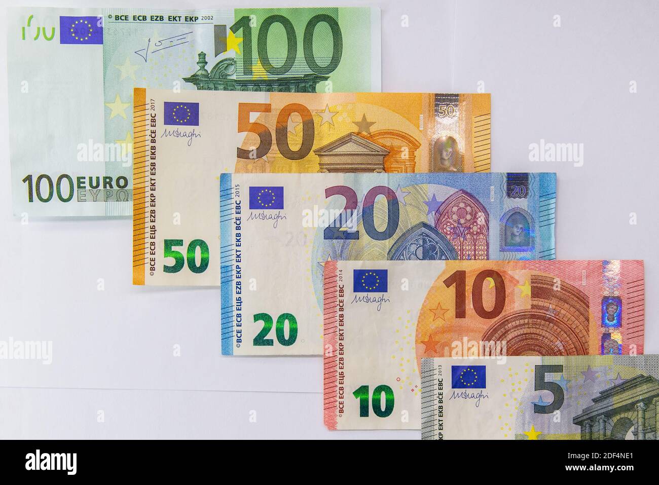 Euro banknotes with different nominal on white background Stock Photo ...