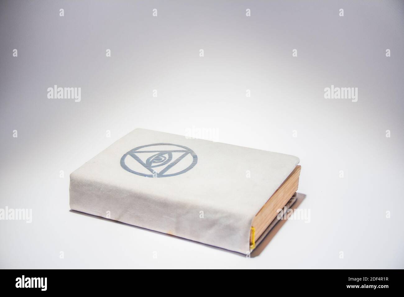 Occult grimoire, white magic book on white background, Empty copy space ...
