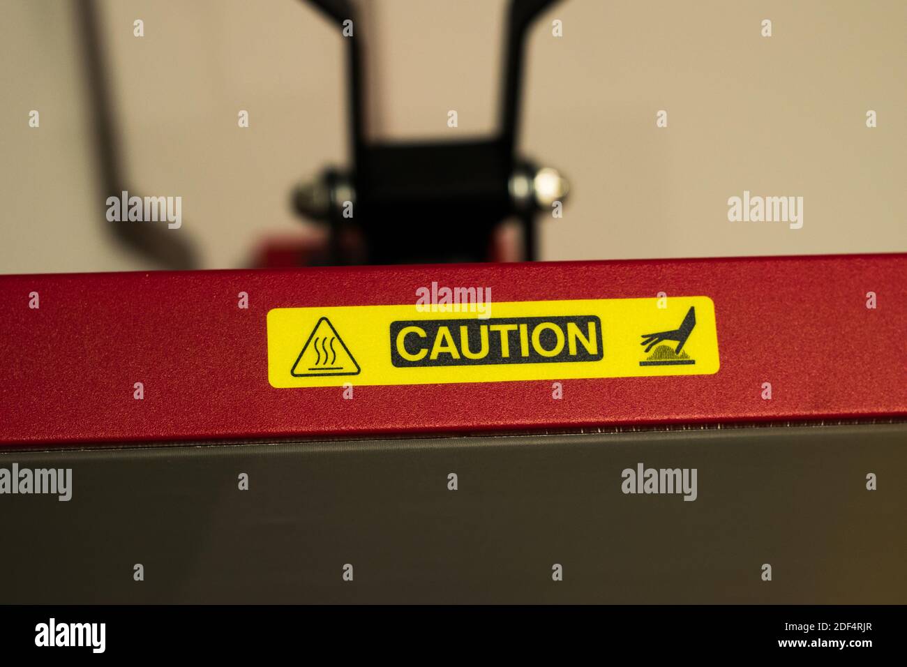 Heat press caution label warm hot Stock Photo - Alamy