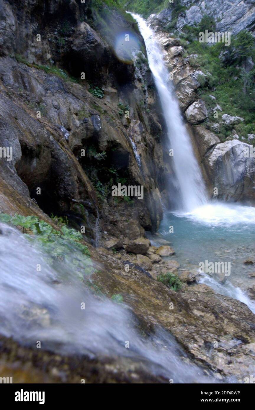 waterfall or cascade in nature, fresh water running down a cliff Stock ...
