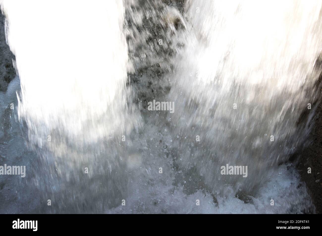 bubbling water flows from two big drain pipes, refreshing wet Stock ...