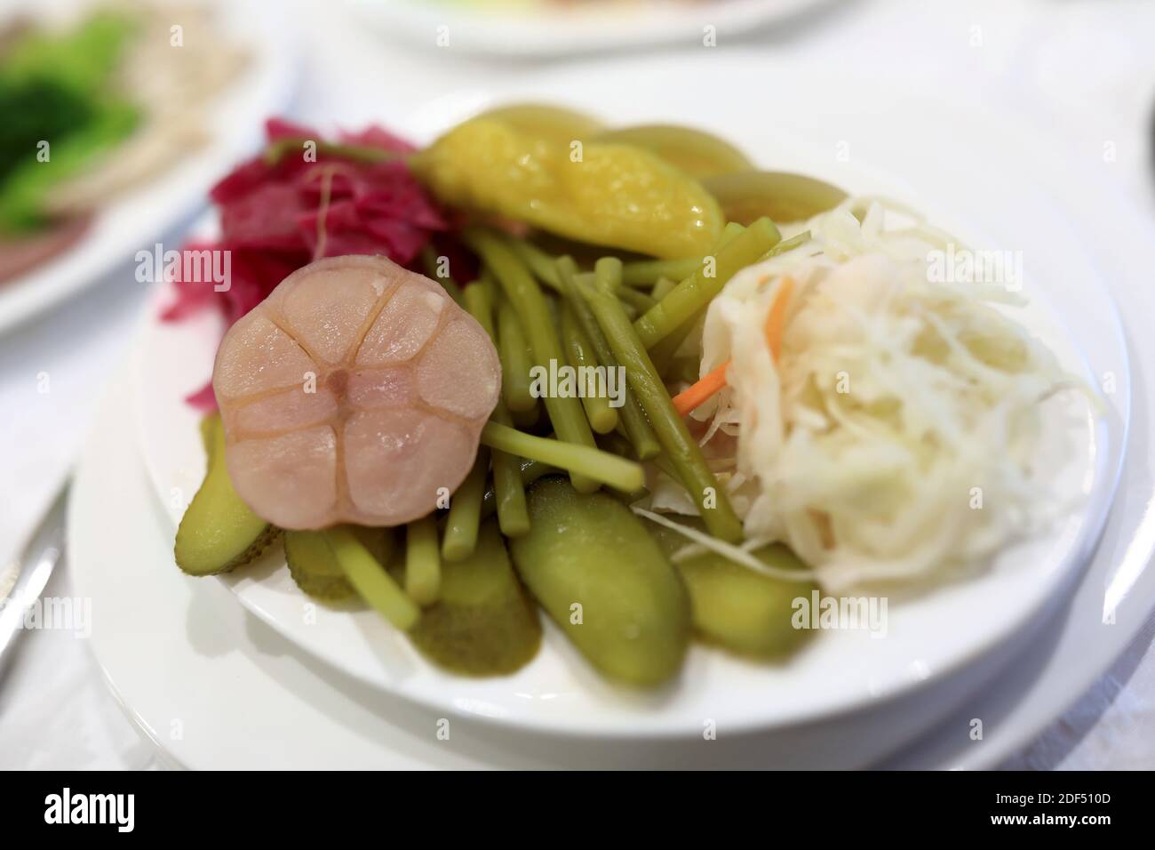 Variety of pickles on plate in restaurant Stock Photo - Alamy