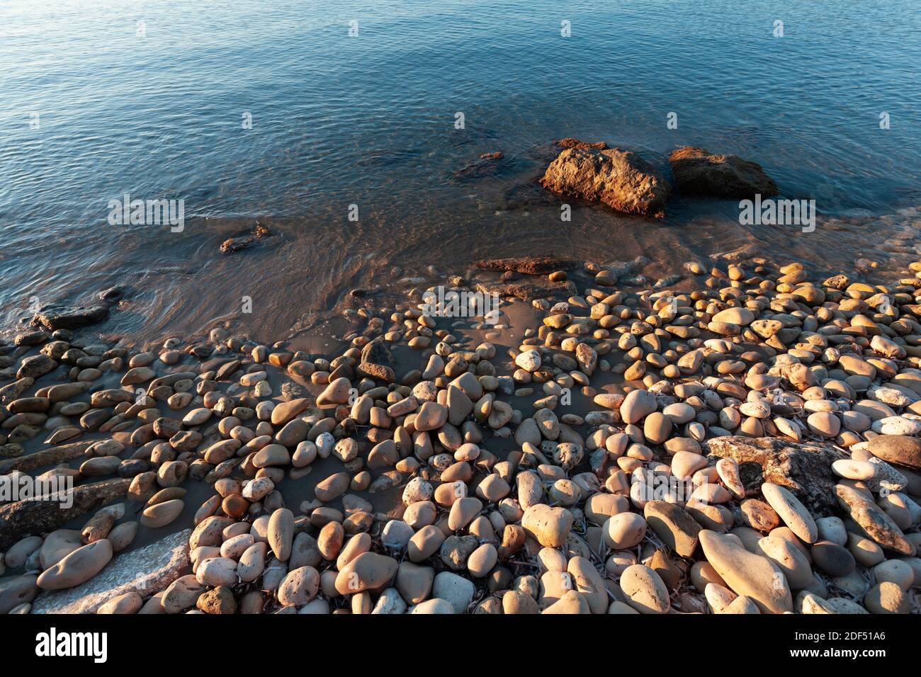 Pebble and seawater. Coast of Zakynthos island, Greece Stock Photo - Alamy