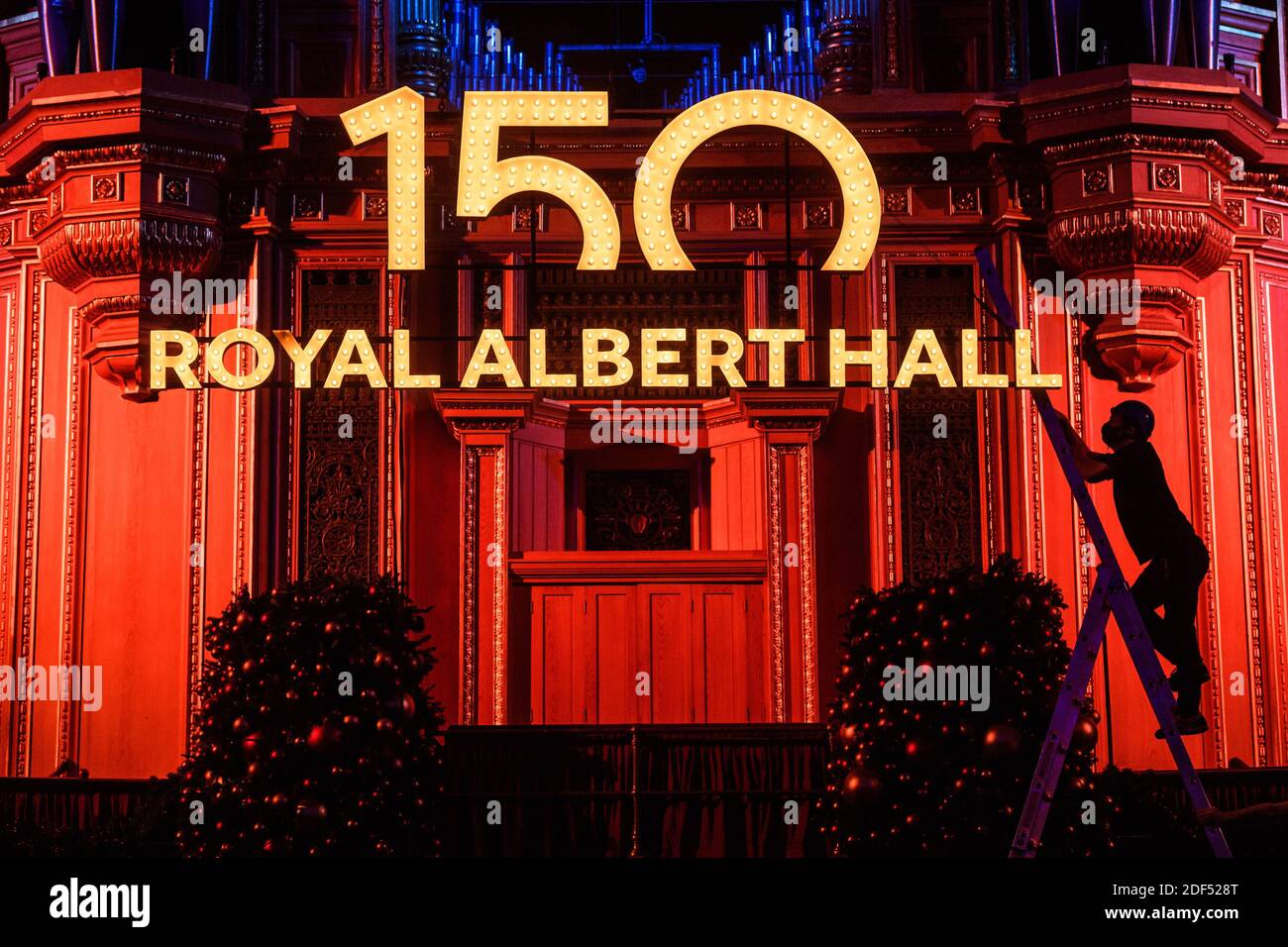 EDITORIAL USE ONLY Staff install and switch on a new sign at the Royal ...