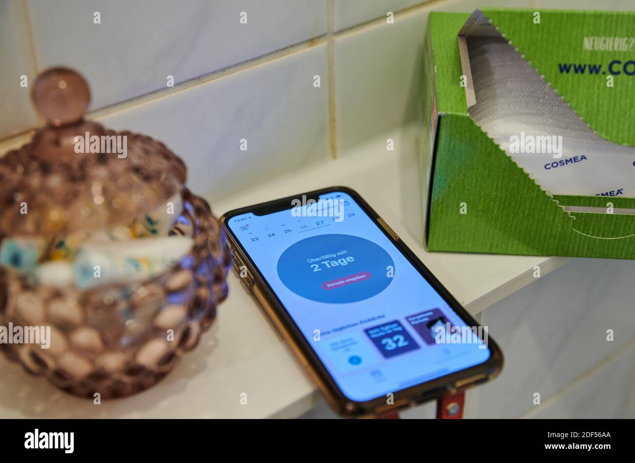 Berlin, Germany. 27th Nov, 2020. Tampons, panty liners and a smartphone ...