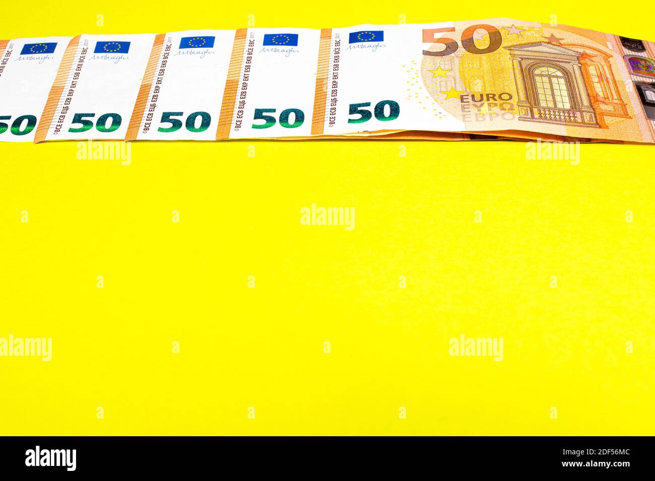 Yellow currency note hi-res stock photography and images - Alamy