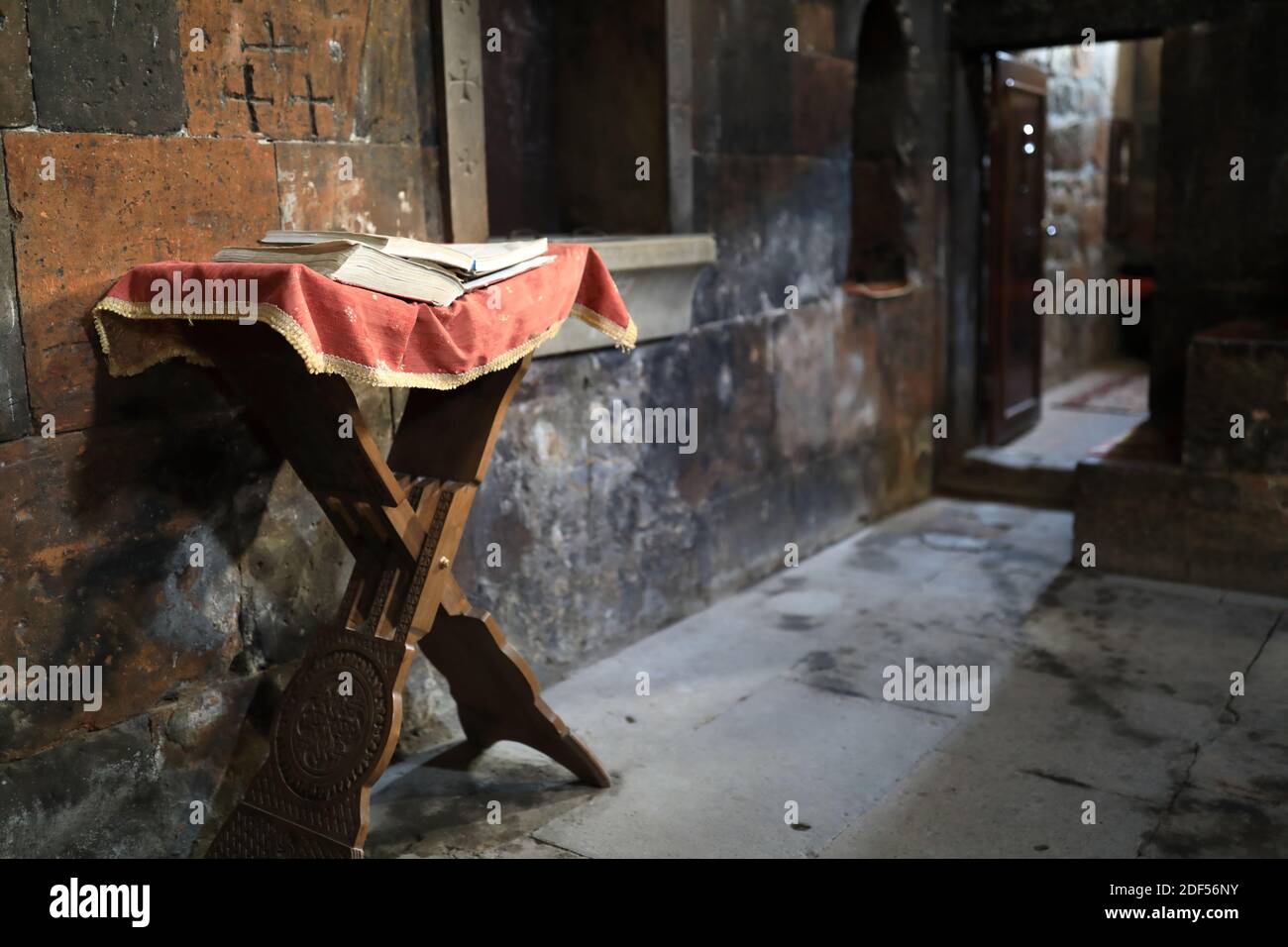 Bible open on wooden lectern in armenian apostolic church Stock Photo ...