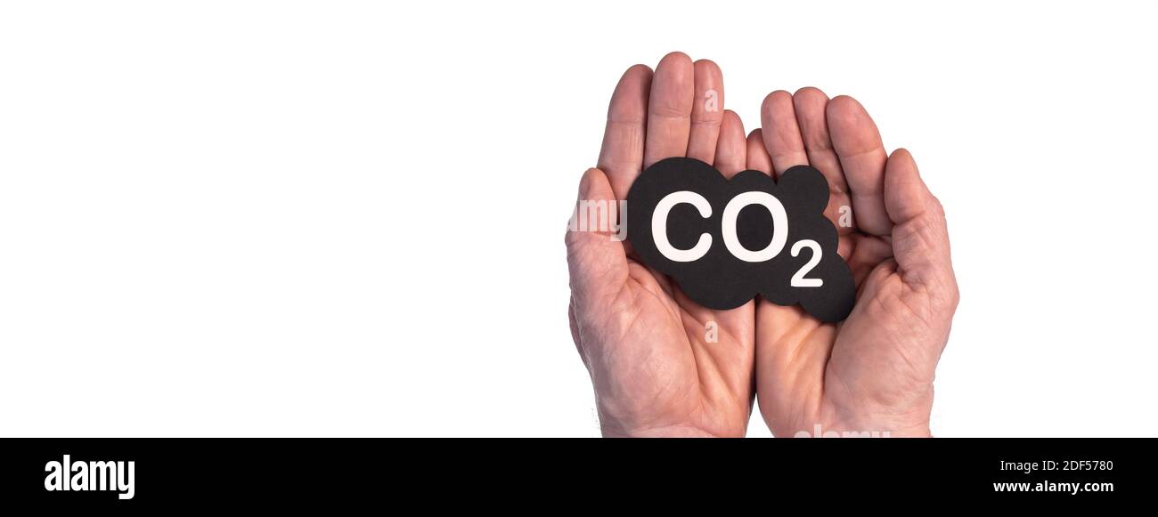 Hands holding a CO2 cloud isolated on white; Concept of air pollution ...