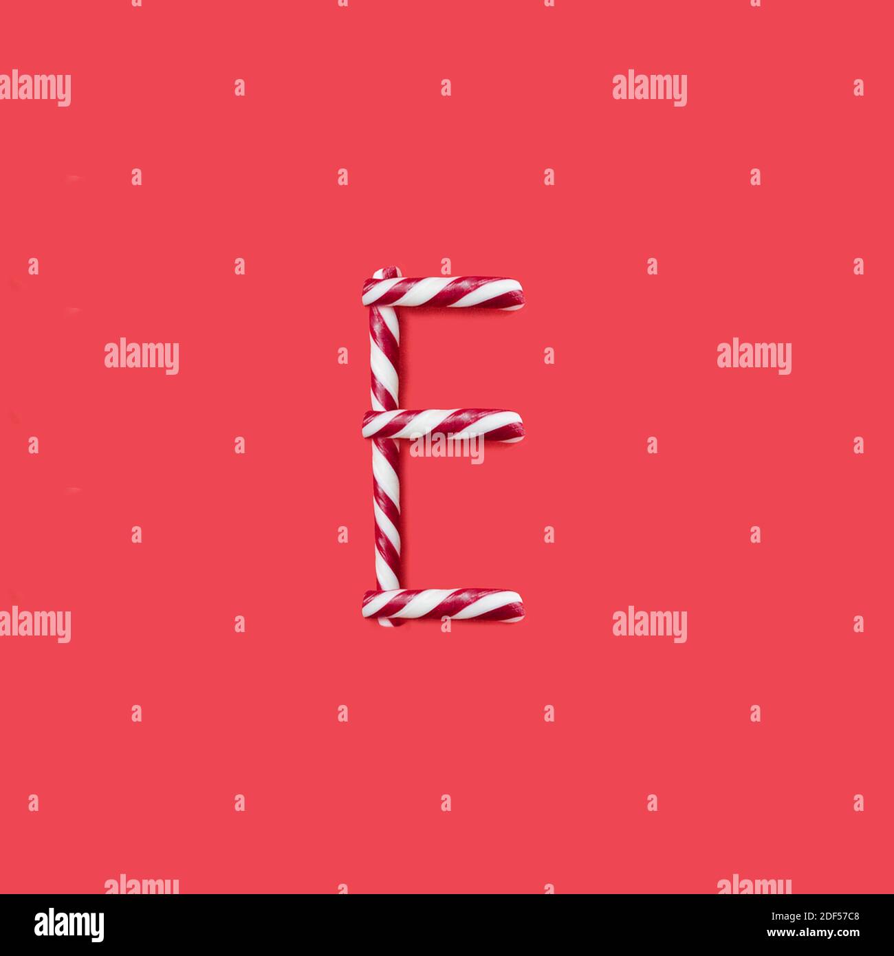 Caps candy and sugar font. Letter E Stock Photo - Alamy