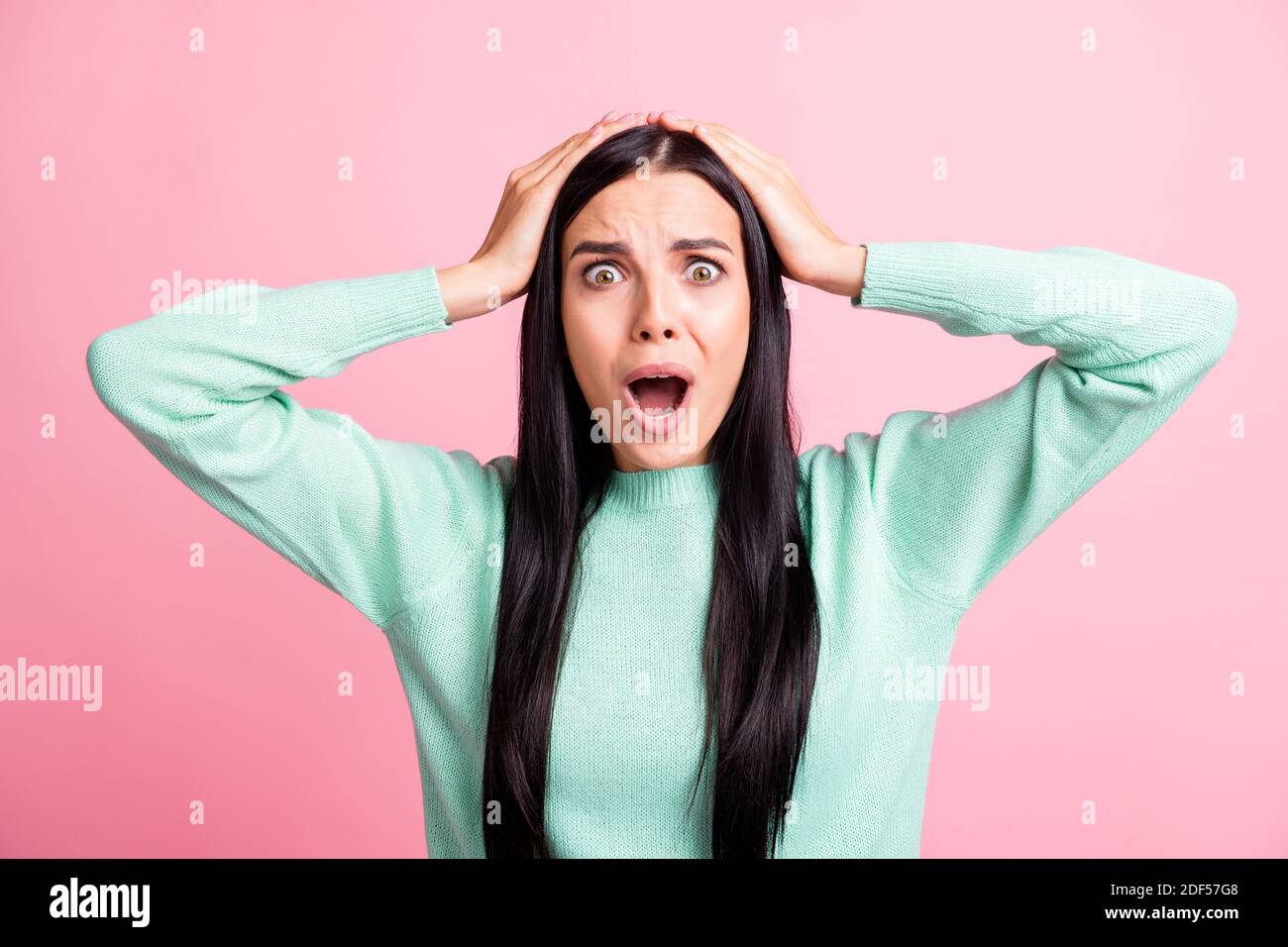 Photo portrait of crazy frustrated young brunette keeping head with ...