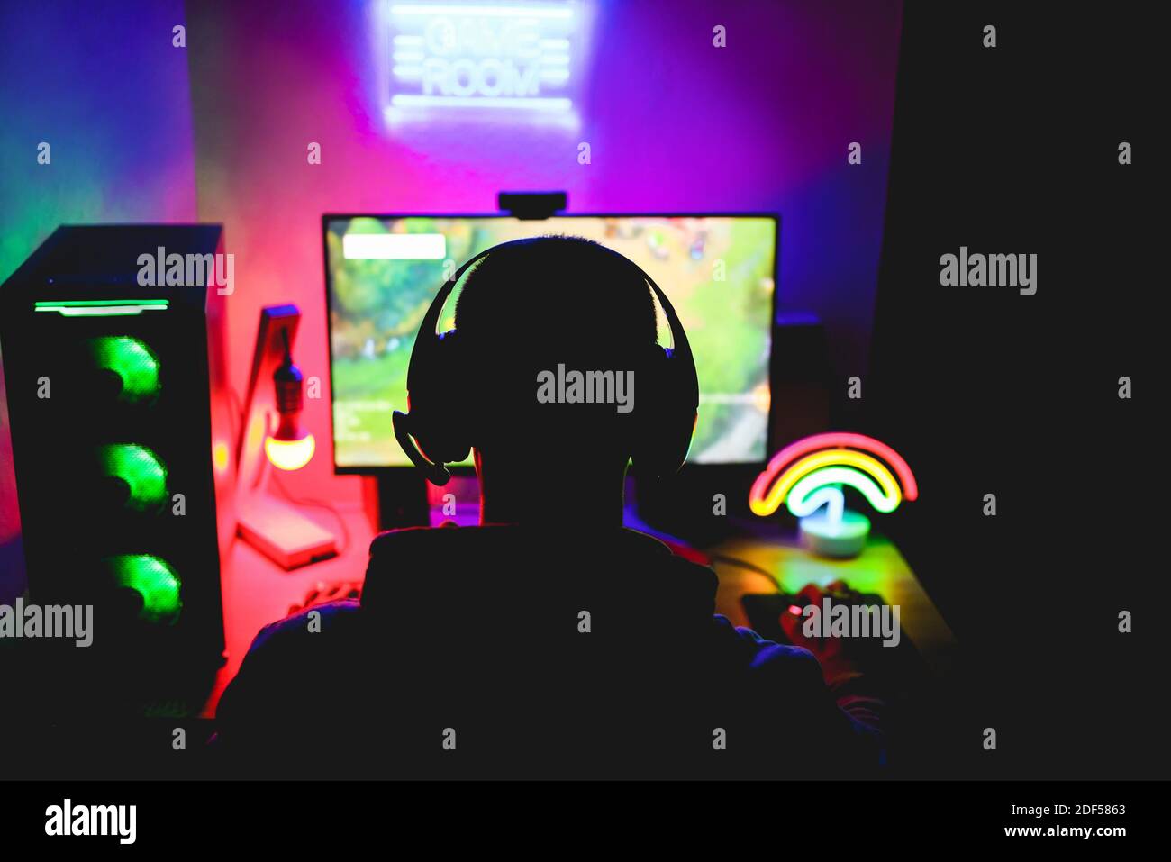 Streamer gamer playing at strategy game in broadcast browser - Young ...