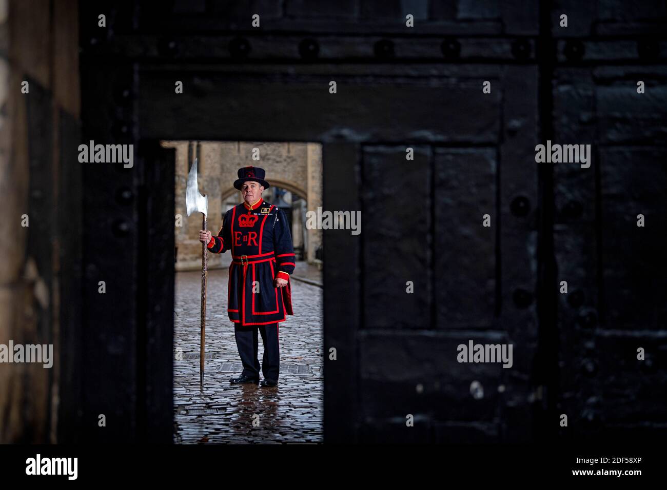 Incoming Yeoman Gaoler Rob Fuller holds the ceremonial Tower Axe, after ...