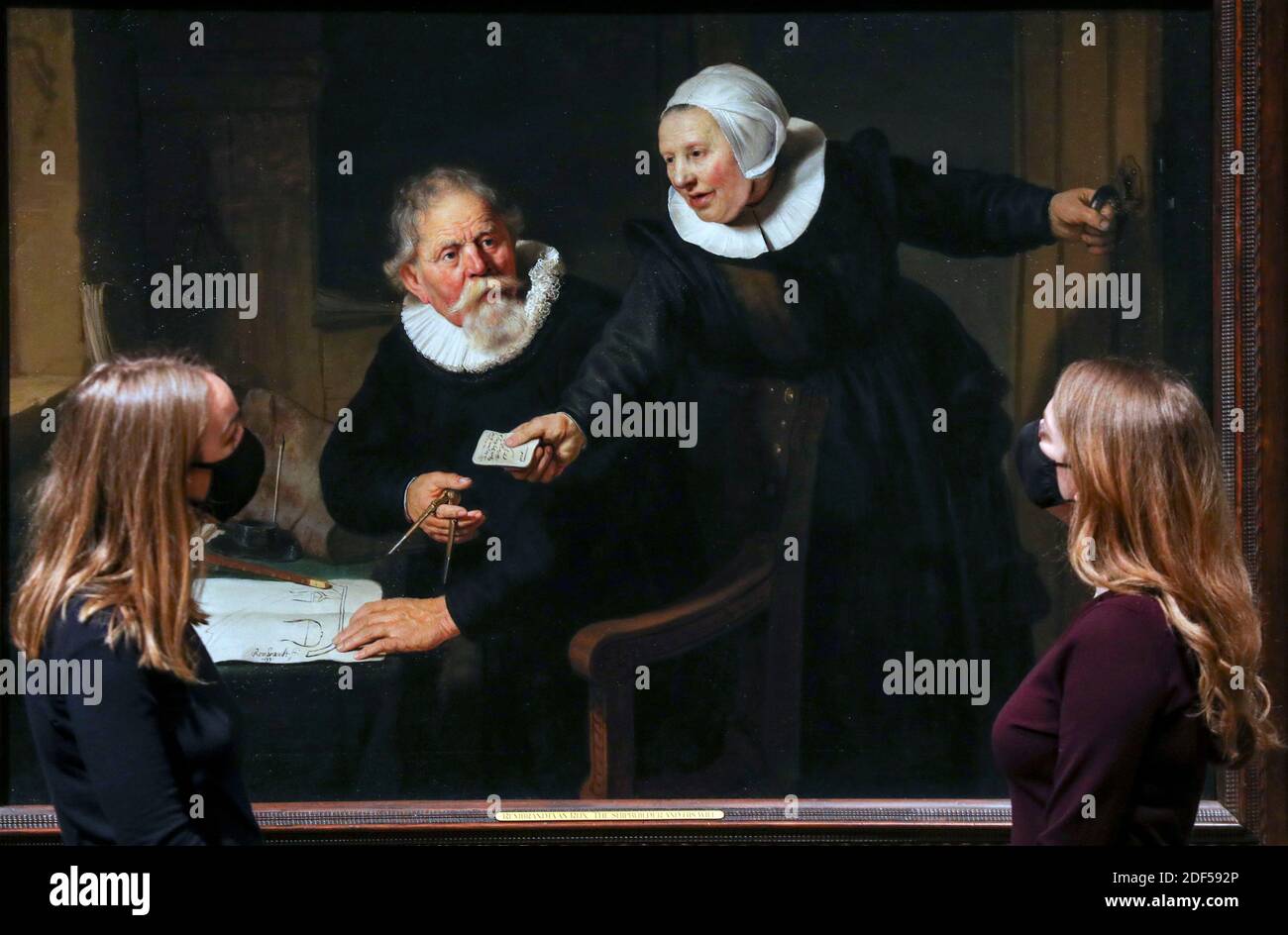 Ladies look at artwork by Rembrandt during a press preview of ...