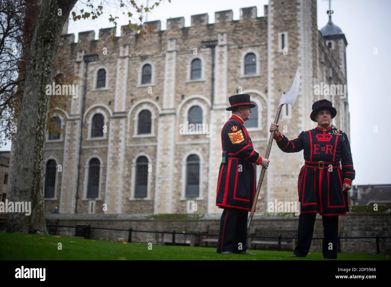 Chief Yeoman Warder Peter McGowran hands over the ceremonial Tower Axe ...