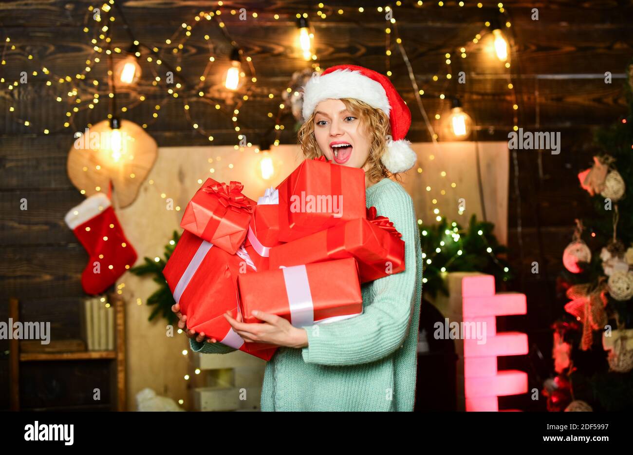 Be generous. Woman hold gift box christmas decorations background. Make ...