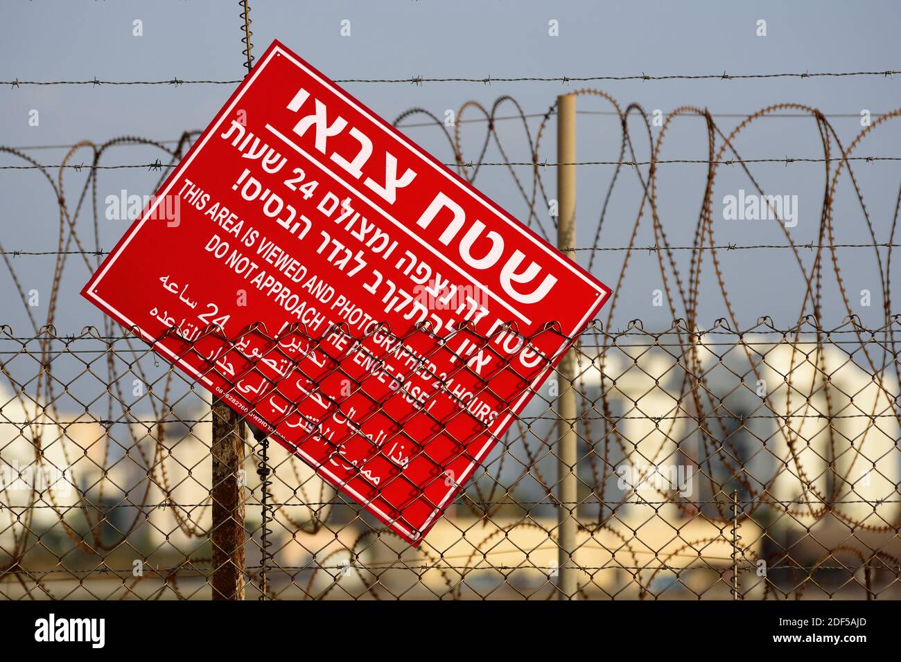Israeli red signboard warning about approaching to closed military area ...