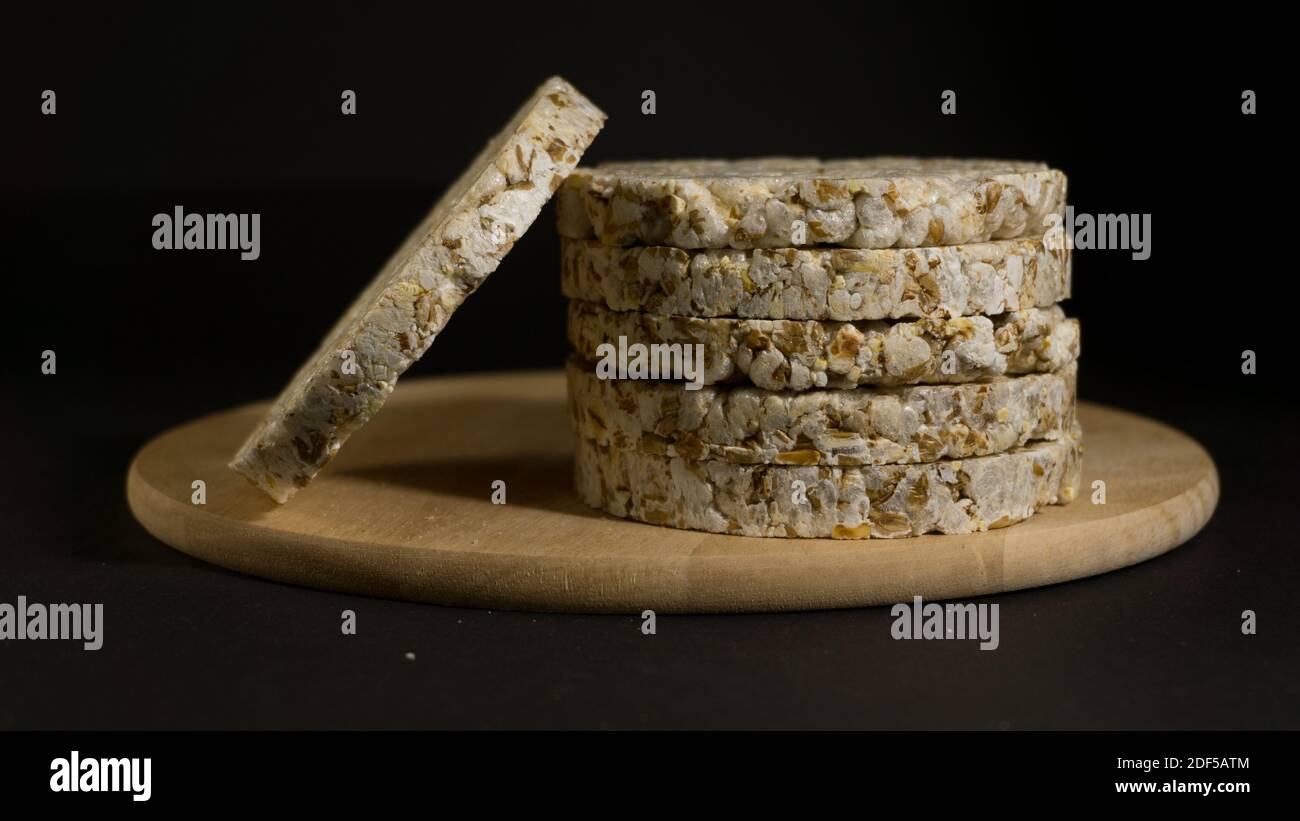 Grain crispbreads crispy rice and diet bread. Stack of puffed whole ...