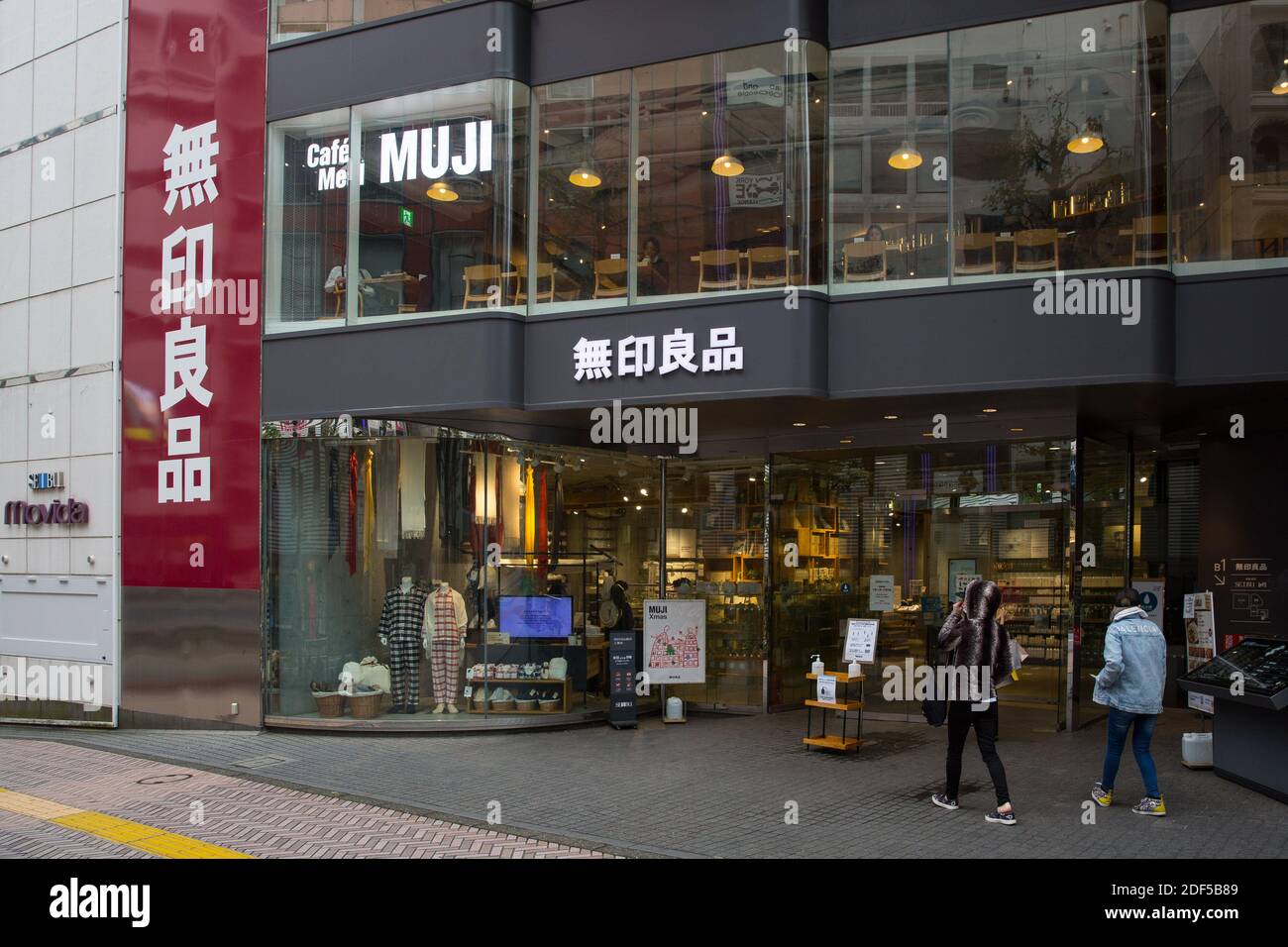 Muji logo and store seen in Shibuya Stock Photo - Alamy