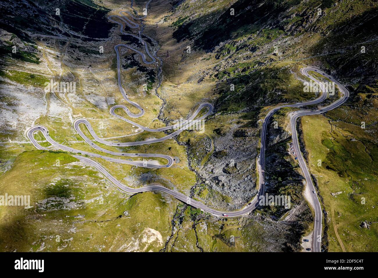 Road in the mountains. Steep turns. View from above. High resolution ...