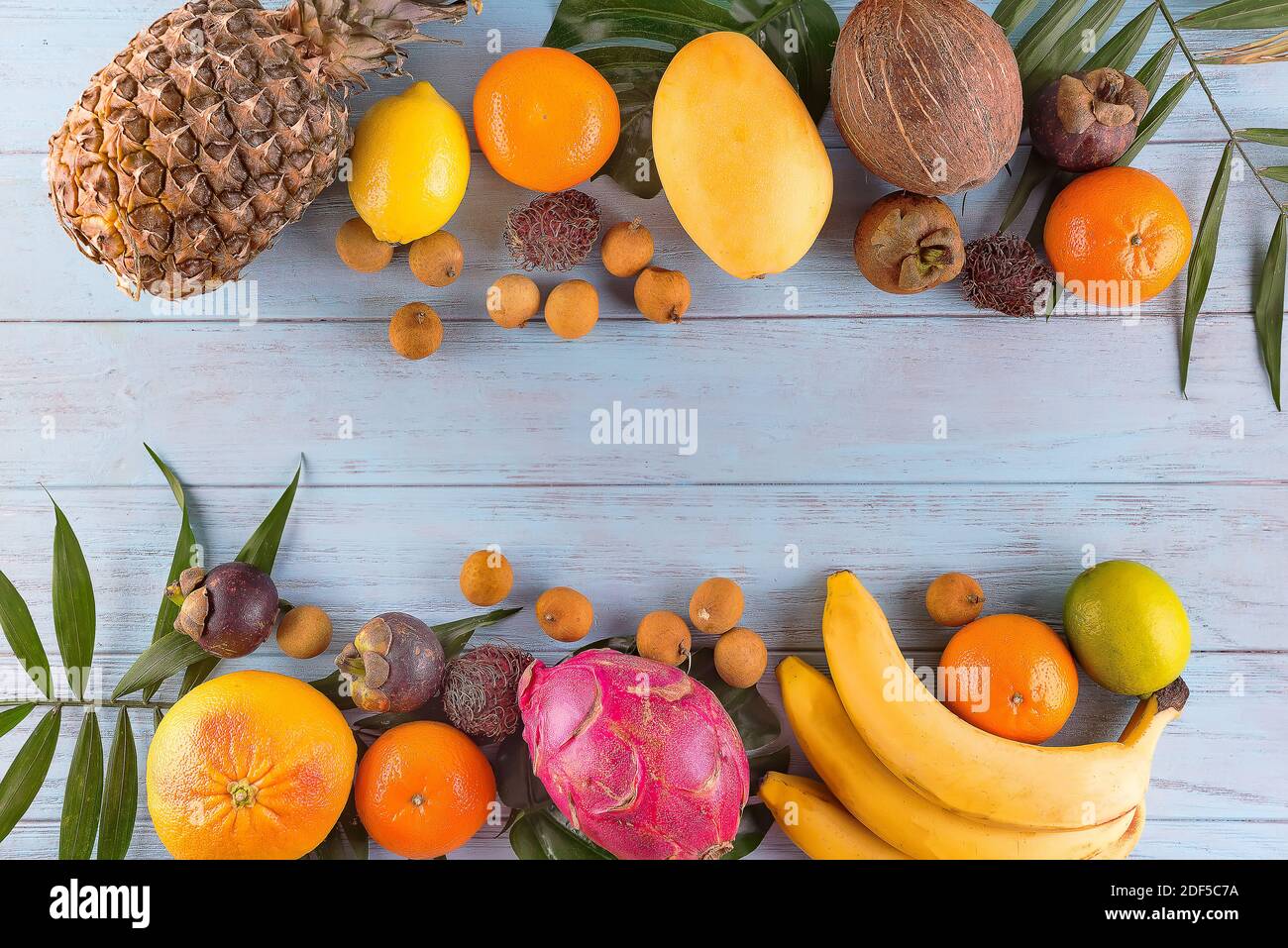 Tropical Fruits and Berry Raw Eating Diet Concept Food neatly arranged ...