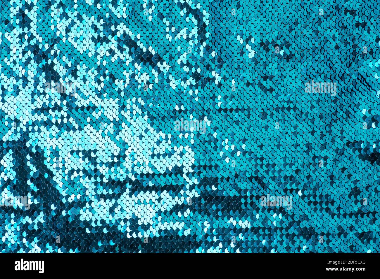 Abstract sequins blue glitter wave background texture Stock Photo - Alamy