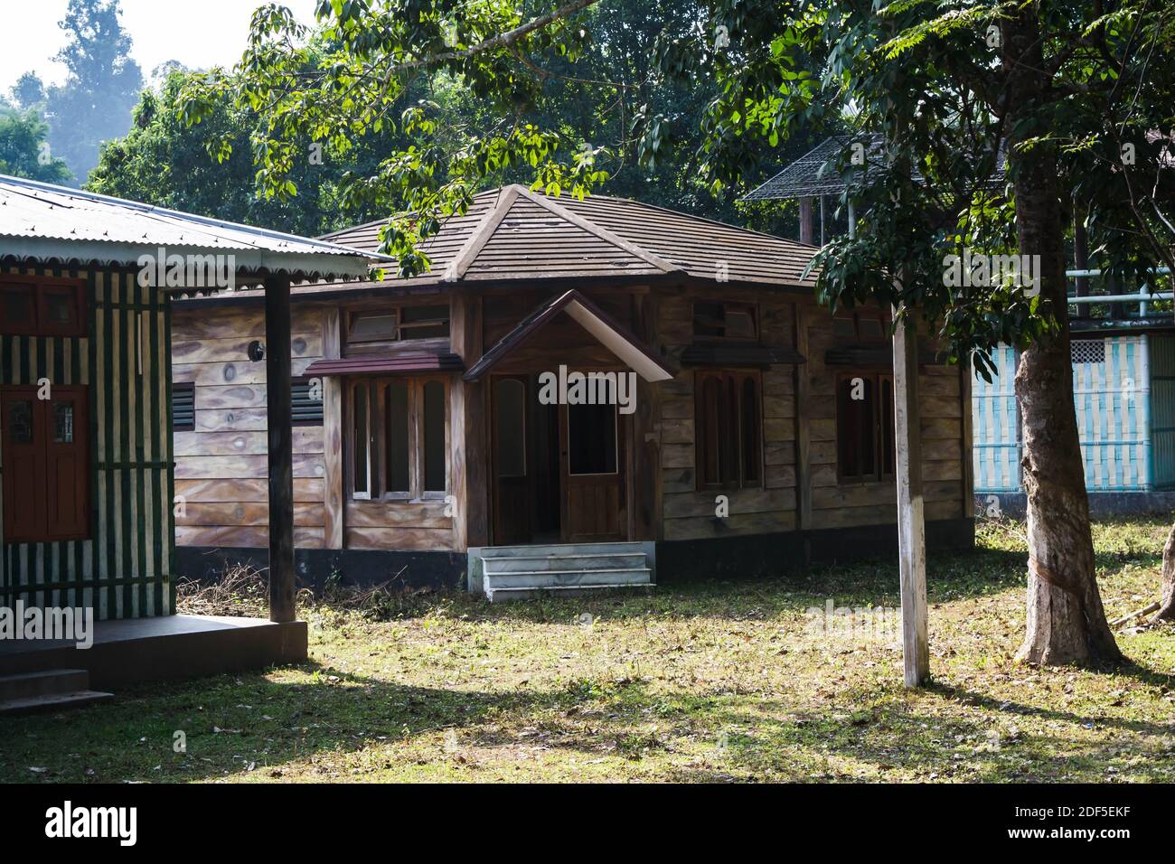 Traditional type of house in Northeast India, nice green trees Stock ...