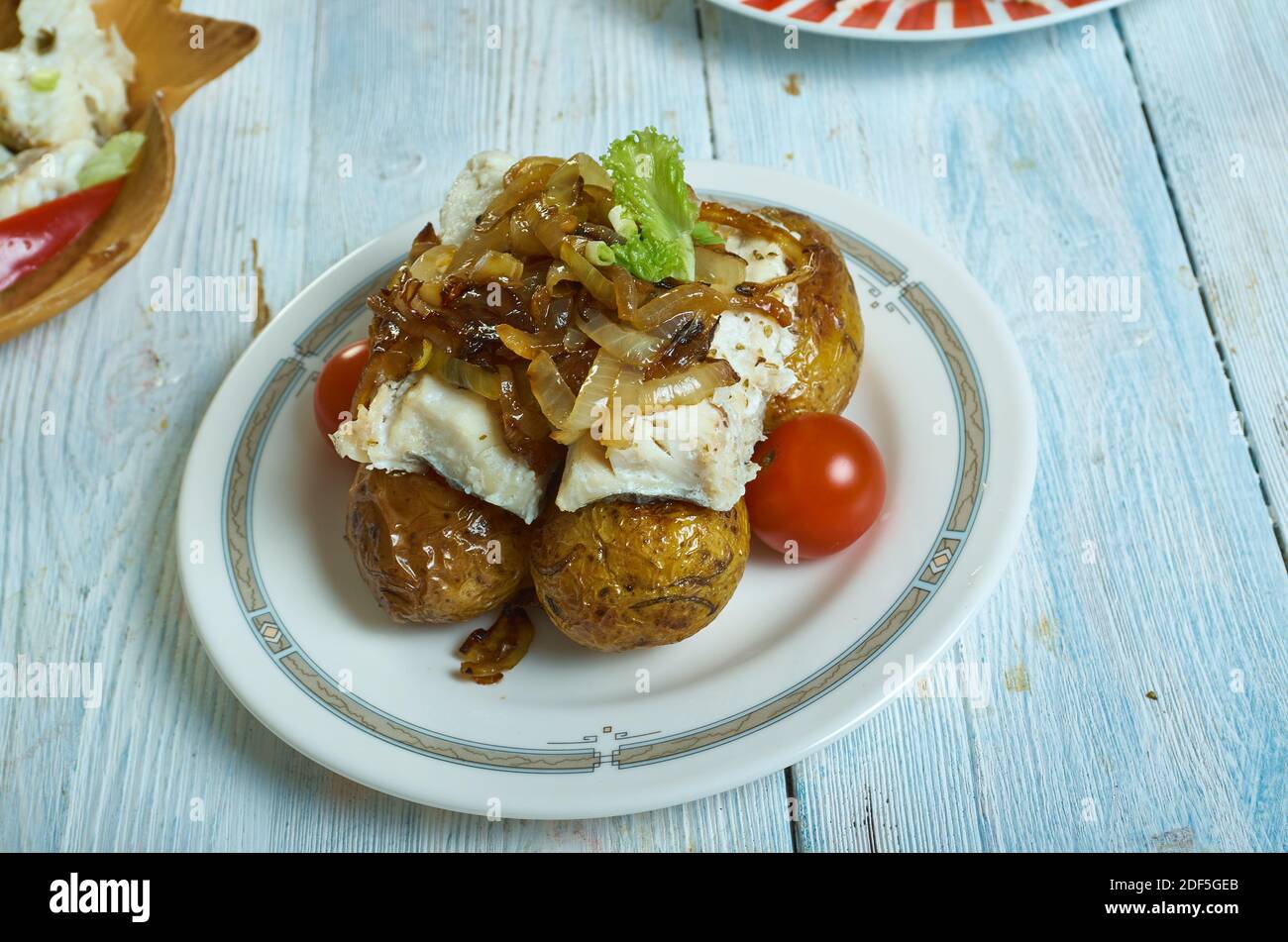 Bacalhau a lagareiro - Portuguese Grilled Salted Cod Fish Stock Photo ...