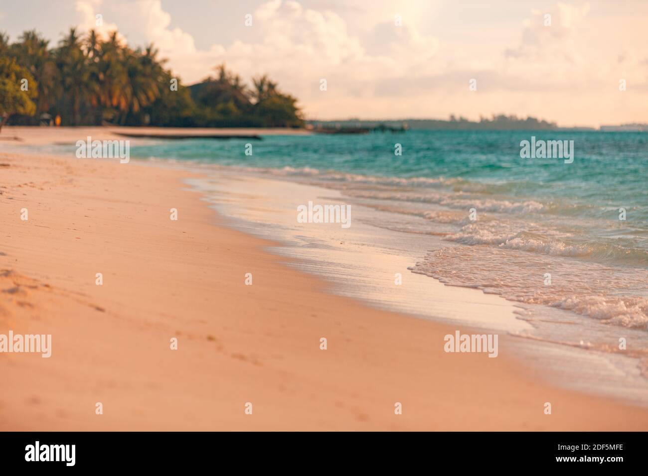 Closeup of sand on beach and blue summer sky. Beach landscape. Empty ...