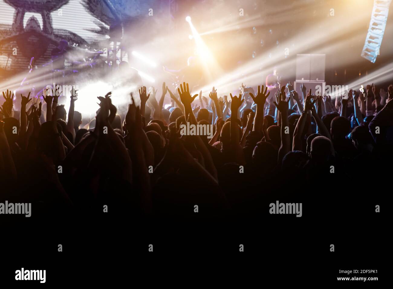 Crowd with raised hands on music concert Stock Photo - Alamy