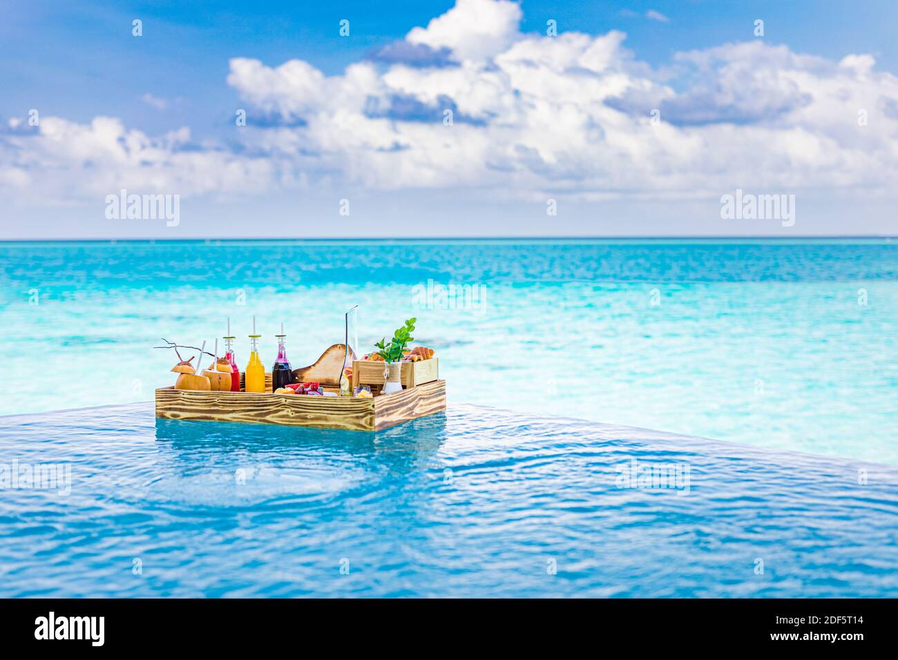 Breakfast in swimming pool, floating breakfast in luxurious tropical ...