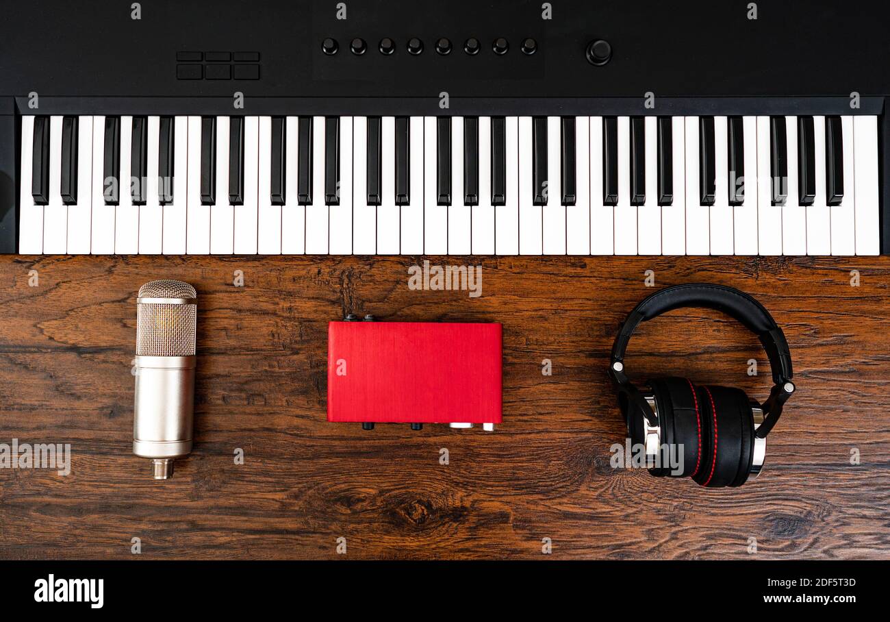 Piano, headphones, microphone and sound card. Recording studio Stock ...