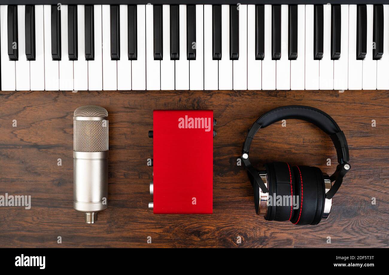 Piano, headphones, microphone and sound card. Recording studio Stock ...