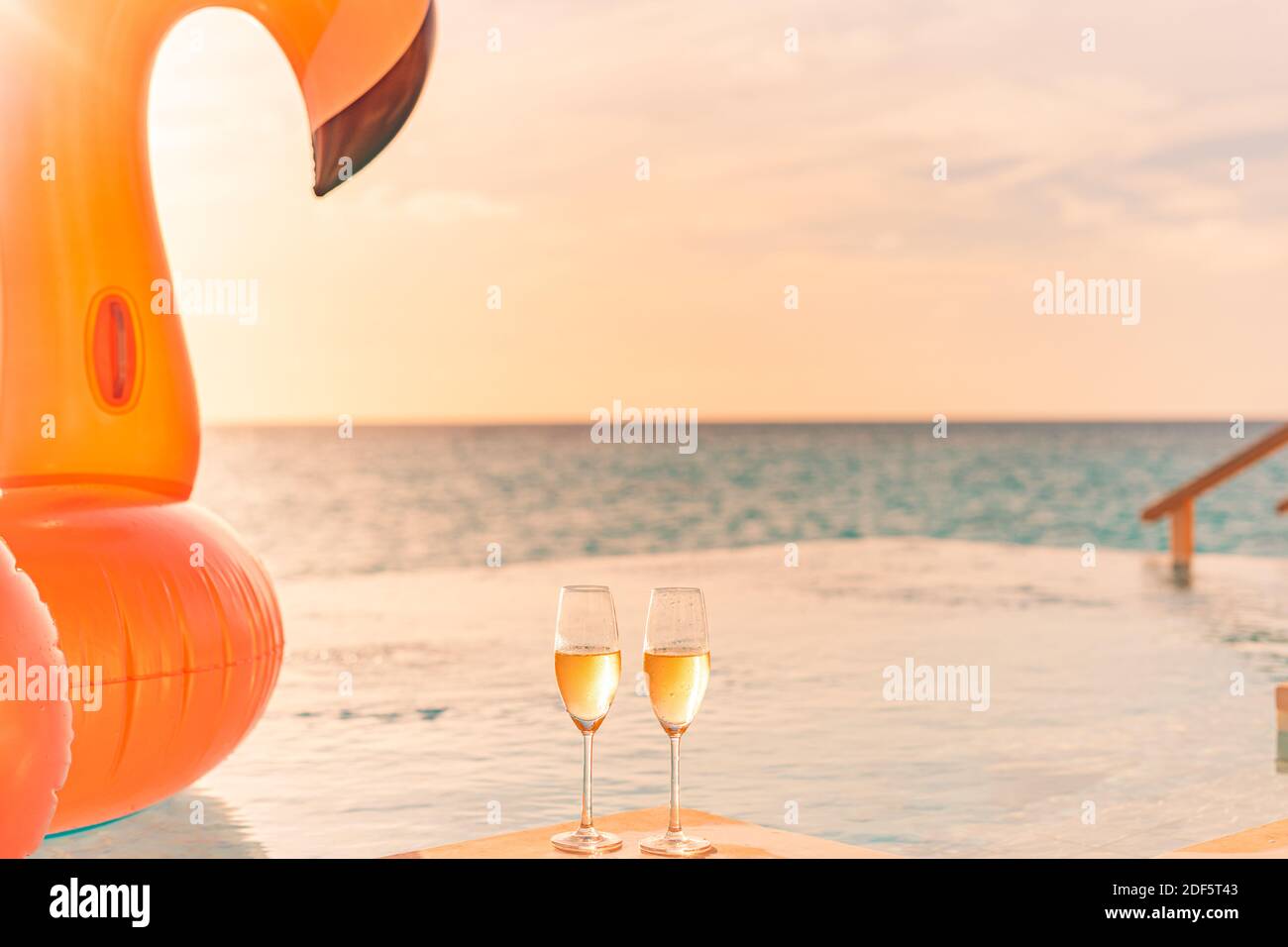 Luxury infinity swimming pool. Sunset holiday travel vacation ...