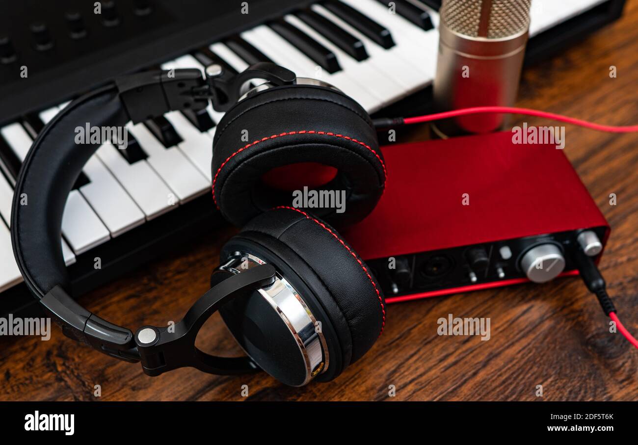 Piano, headphones, microphone and sound card. Recording studio Stock ...