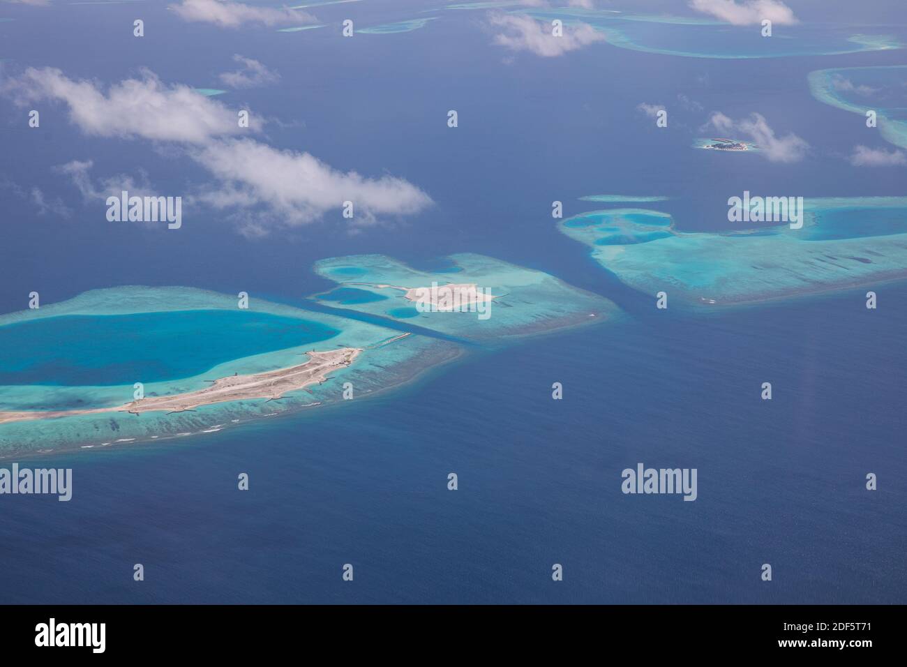 Aerial view of coral reef and atoll hi-res stock photography and images ...