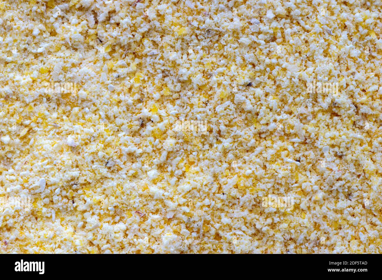 Macro view of ground cornmeal with varied texture and color Stock Photo ...
