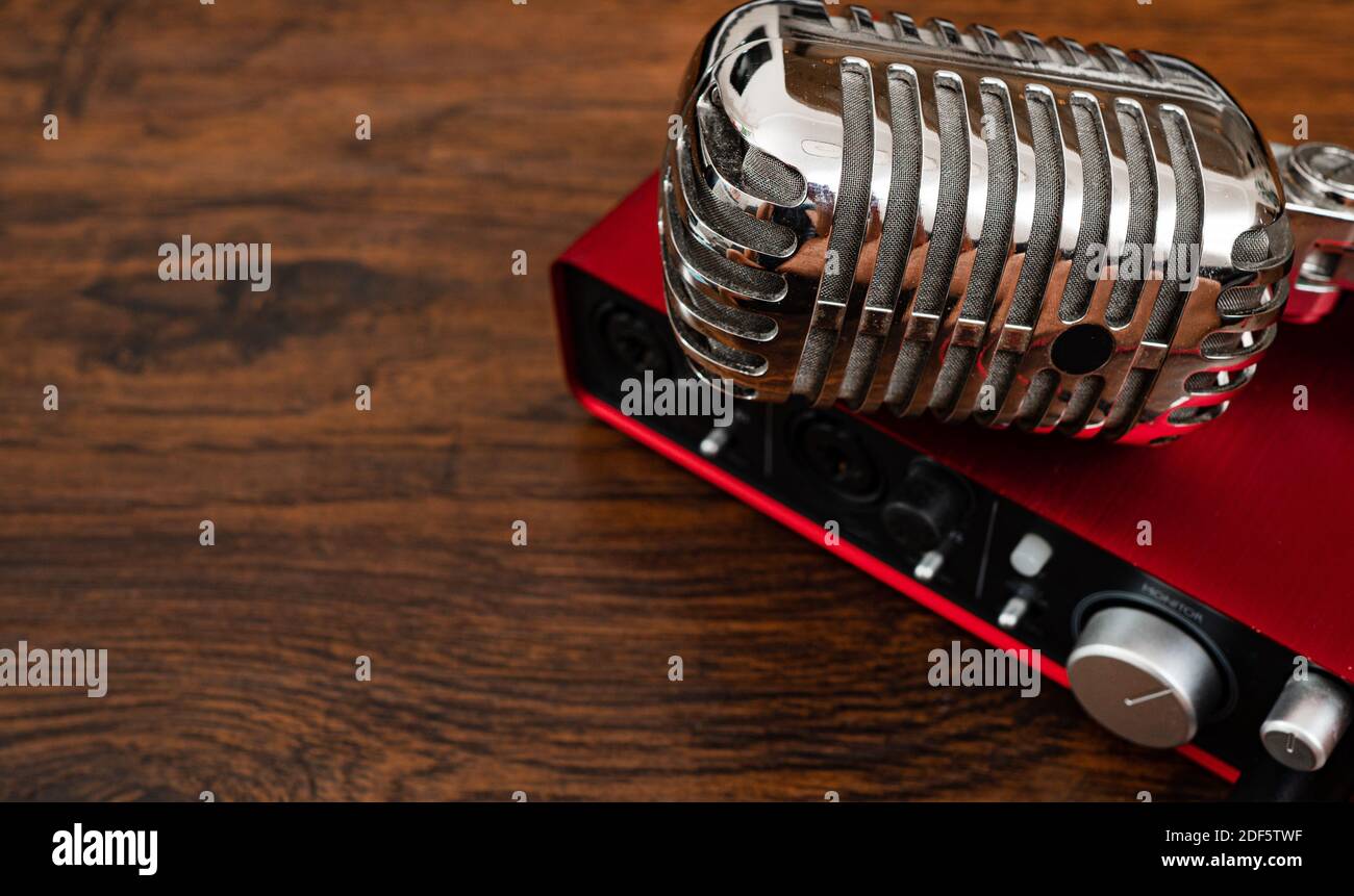 Microphone and sound card. Home recording studio Stock Photo - Alamy