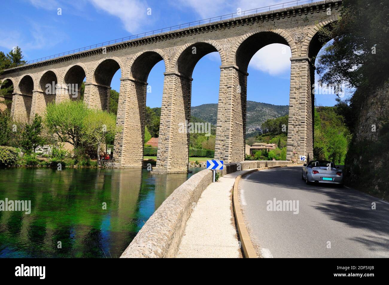 Huge arch bridge built over Sorgue river in southeastern France Stock ...