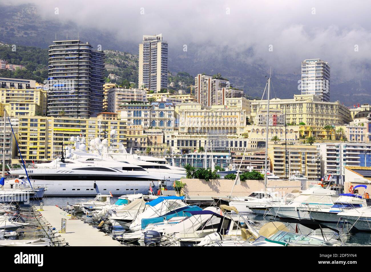 View to Monte Carlo bay with the yacht piers and hotels Stock Photo - Alamy