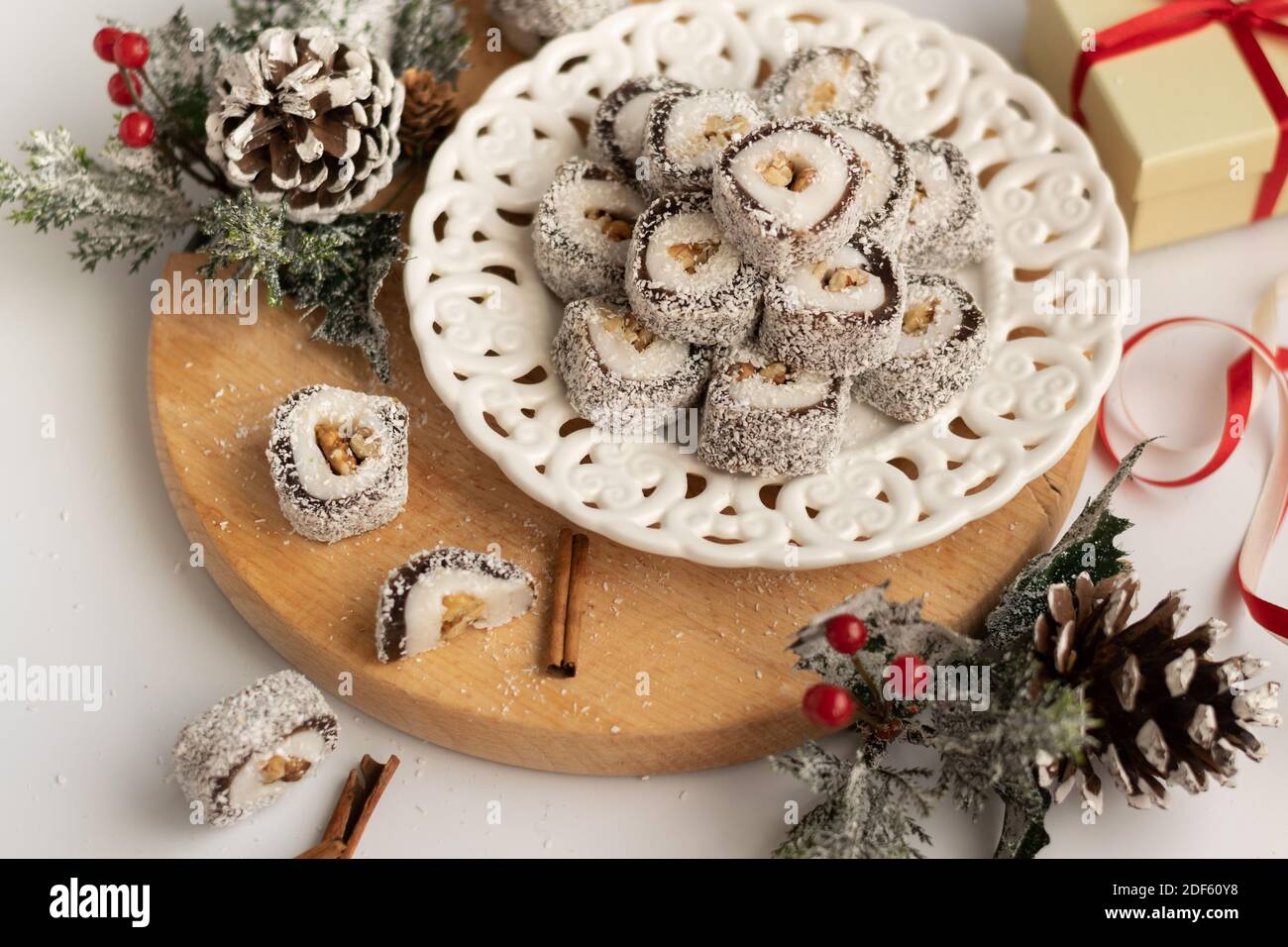 Christmas festive sweets with seasons decorations on white background ...