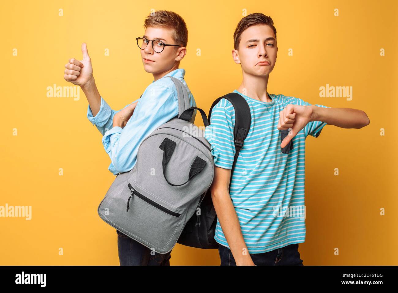 Two teenagers, guys show opposite emotions, friends show positive and ...