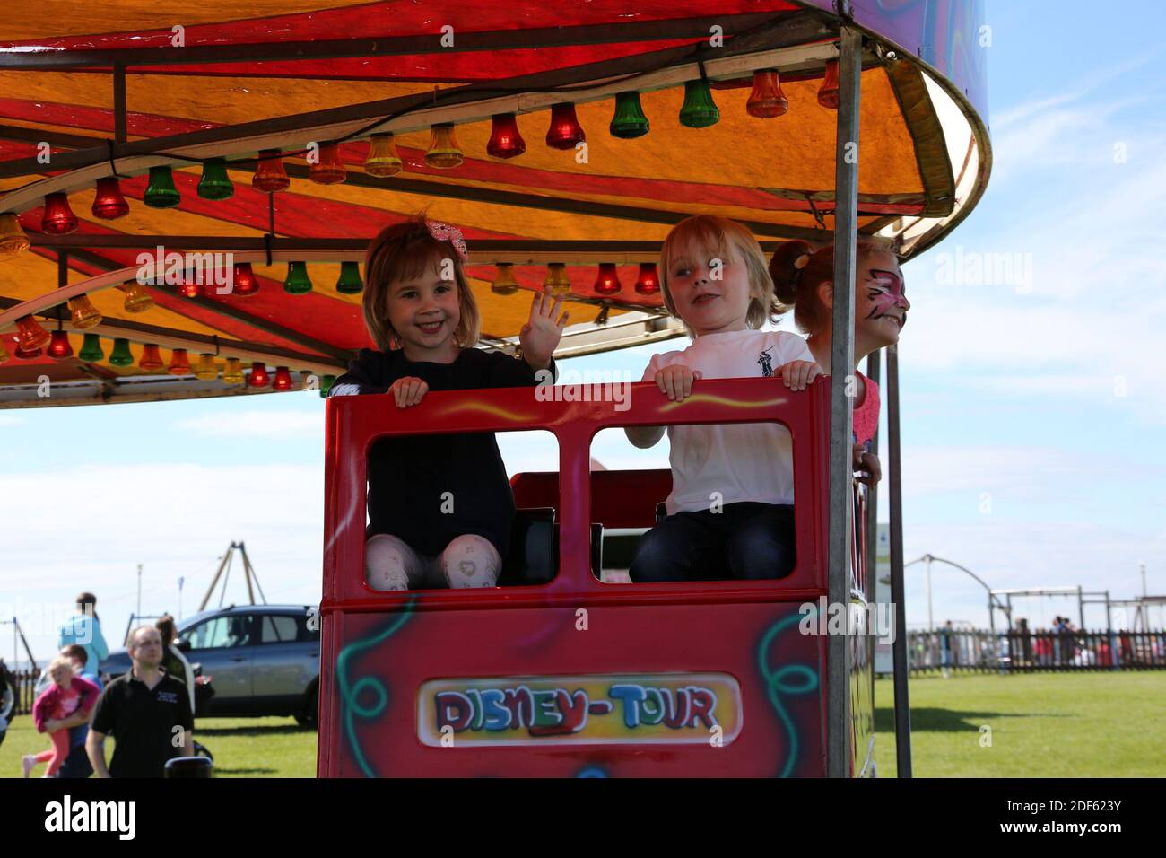 Children On A Roundabout At A Fun Fair High Resolution Stock ...