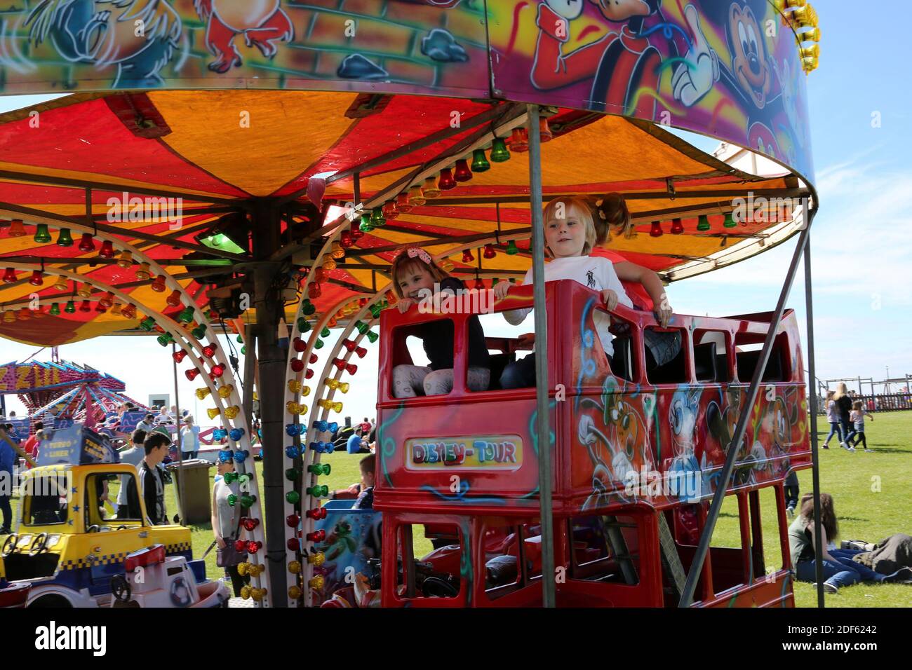 Children On A Roundabout At A Fun Fair High Resolution Stock ...